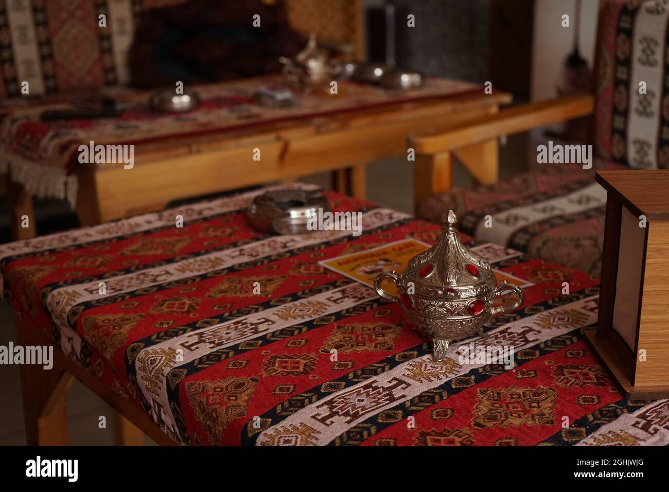 Close-up shot of wooden tables with traditional Middle Eastern ...