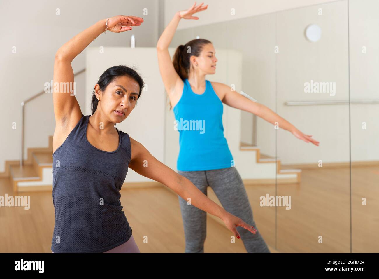 Group of smiling women training sport dance Stock Photo - Alamy