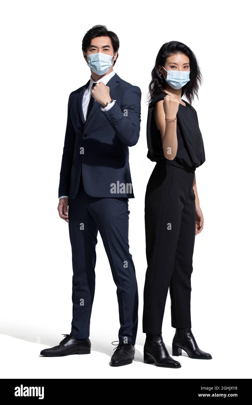 Business people wearing surgical mask Stock Photo - Alamy