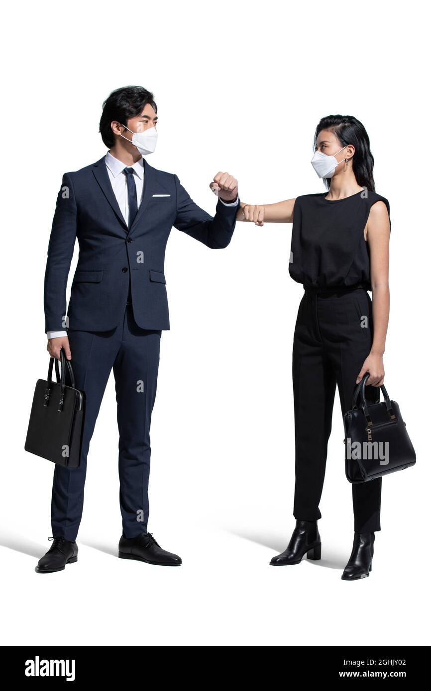 Business people wearing surgical mask Stock Photo - Alamy