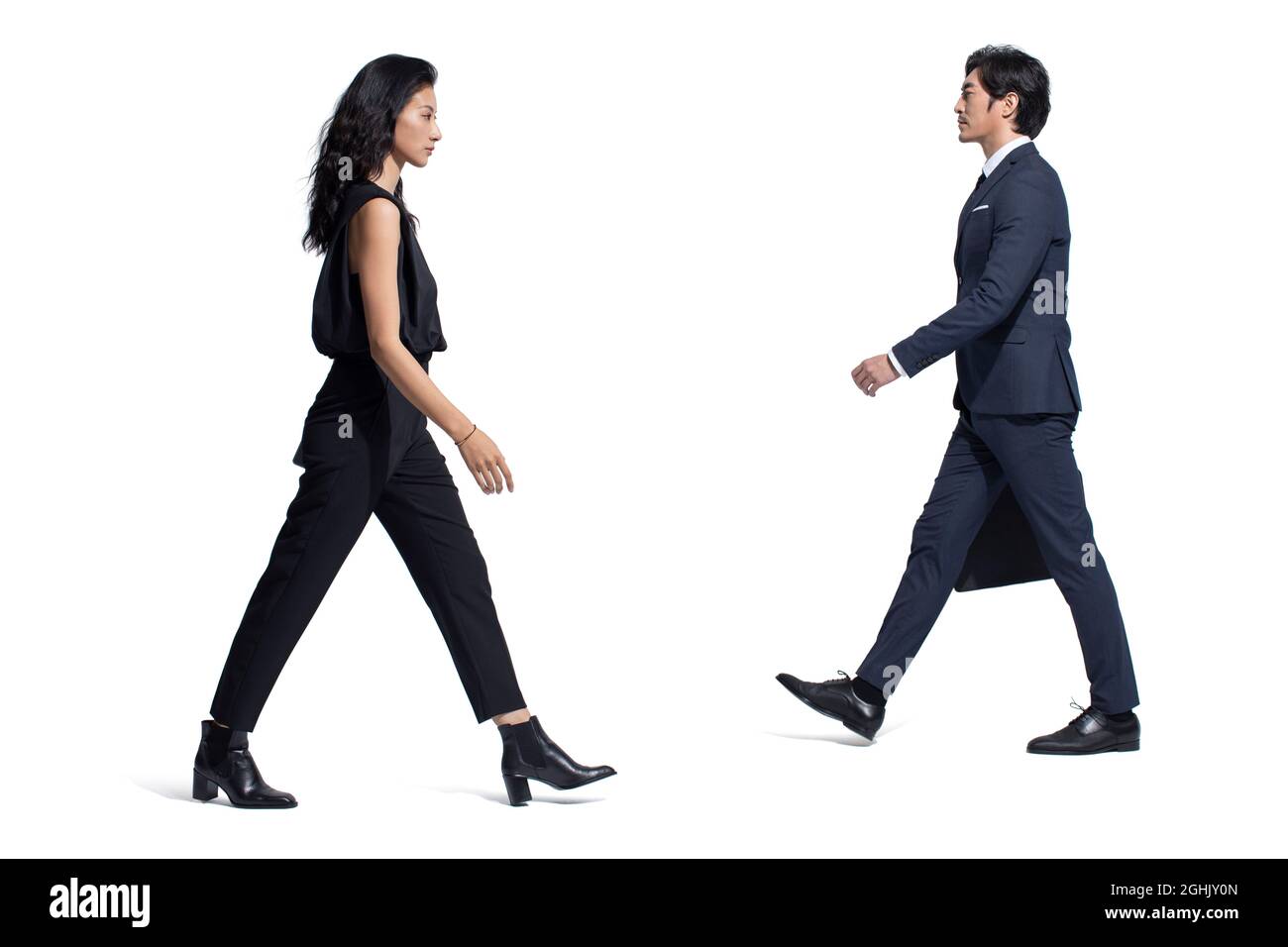 Confident business people walking Stock Photo - Alamy