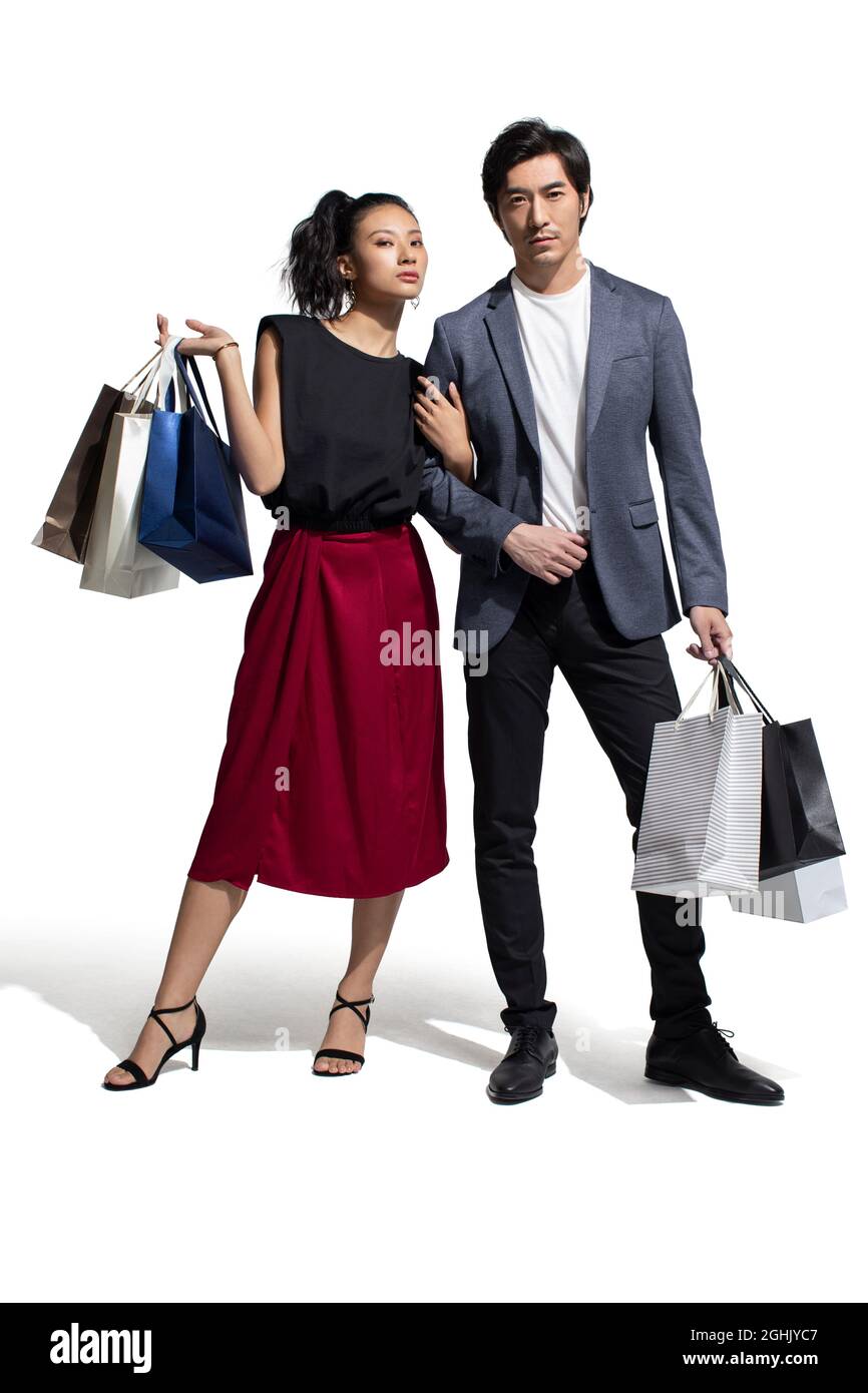 Fashionable couple shopping together Stock Photo - Alamy