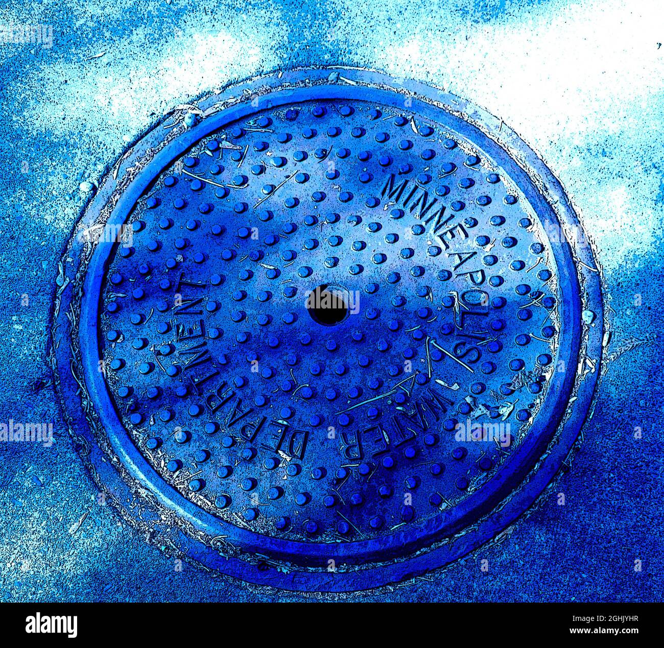 Blue manhole cover Stock Photo - Alamy