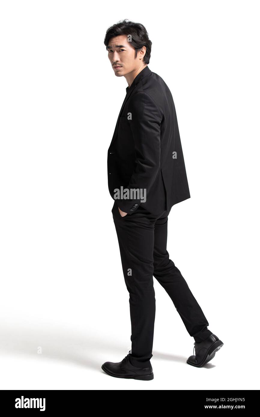 Man walking away suit Cut Out Stock Images & Pictures - Alamy