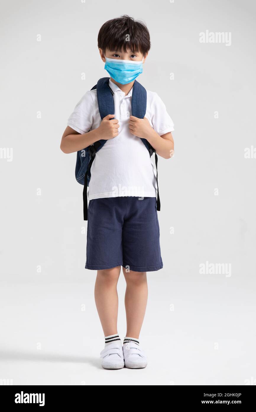 Little boy wearing surgical mask Stock Photo - Alamy