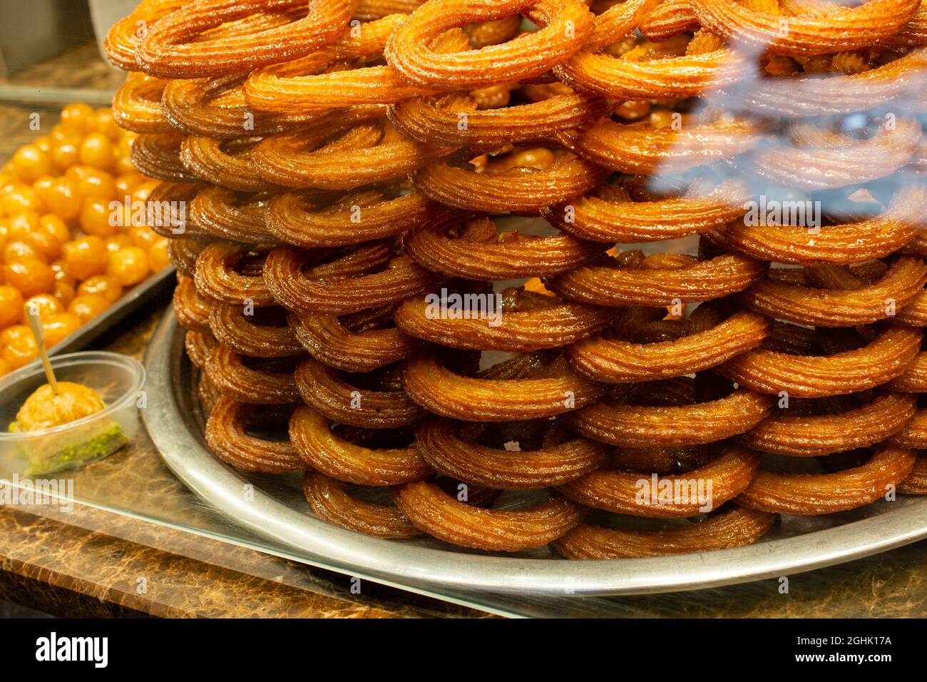 Closeup of Turkish churros behind the glass Stock Photo - Alamy