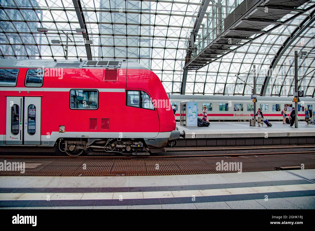 DB or Deutsche Bahn train at the terminal of Berlin Hauptbahnhof which ...