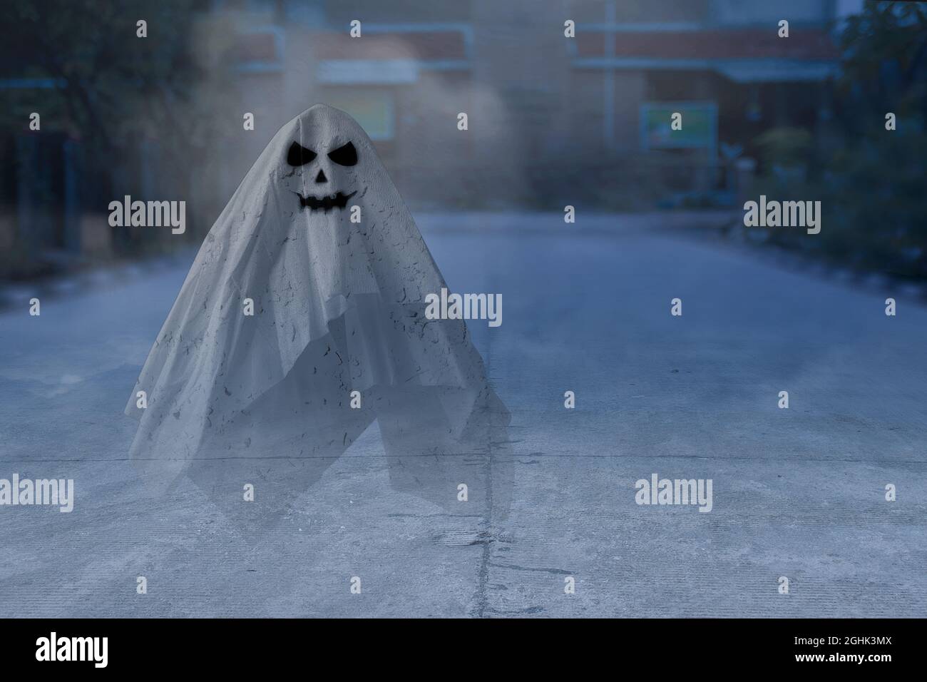 White ghost haunting with a night scene background. Halloween concept ...