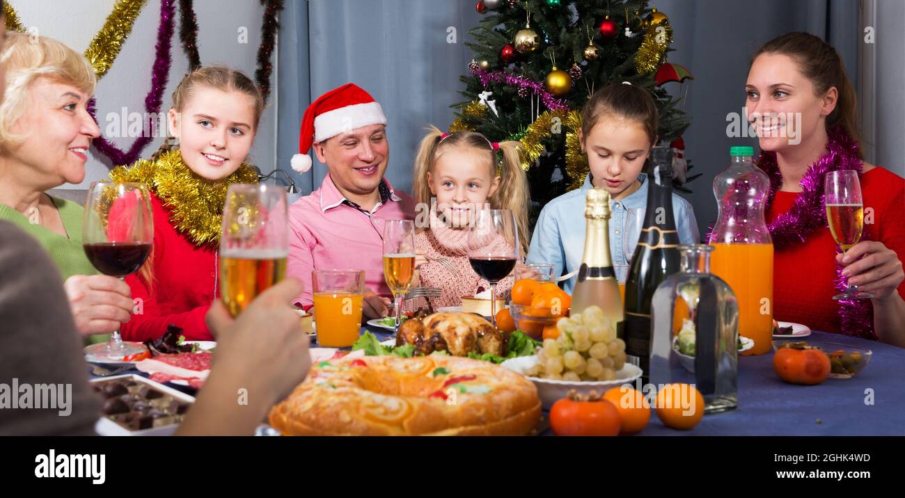 Family celebrating New Year together Stock Photo - Alamy