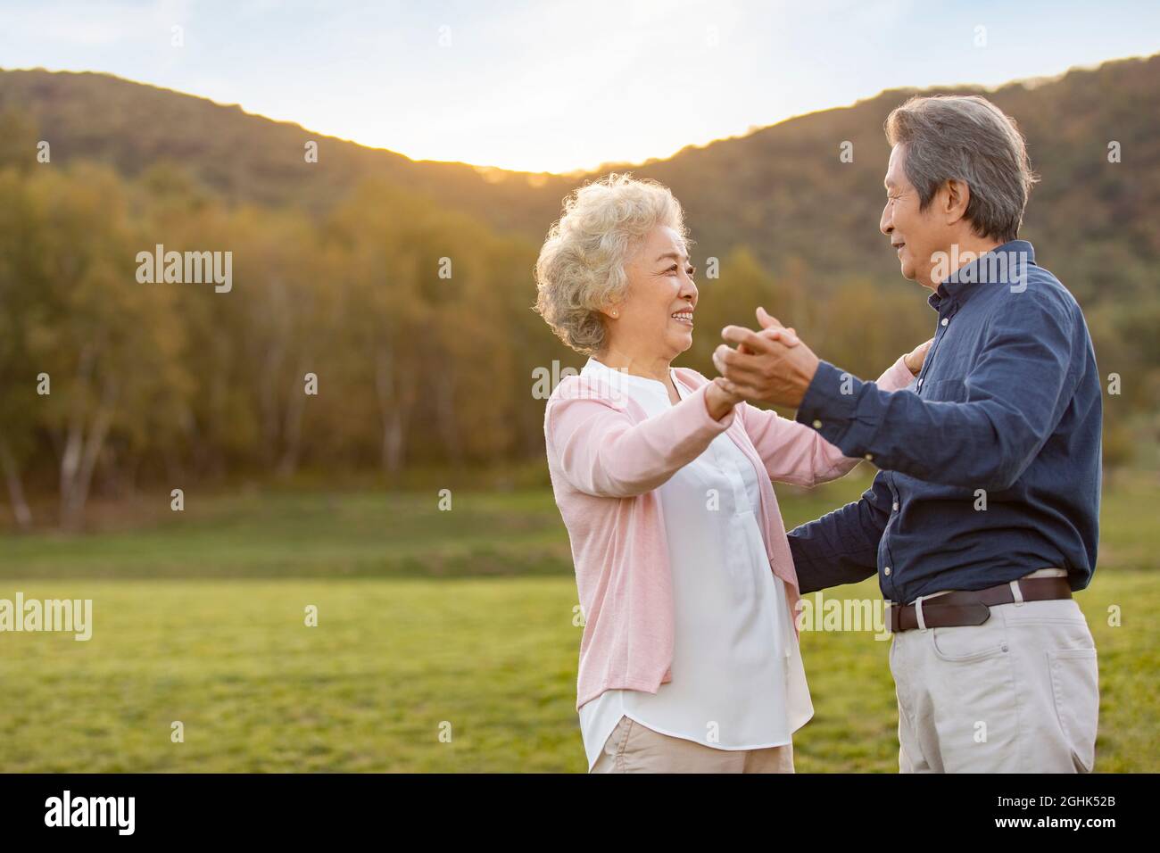 Happy asian senior couple dancing hi-res stock photography and images ...
