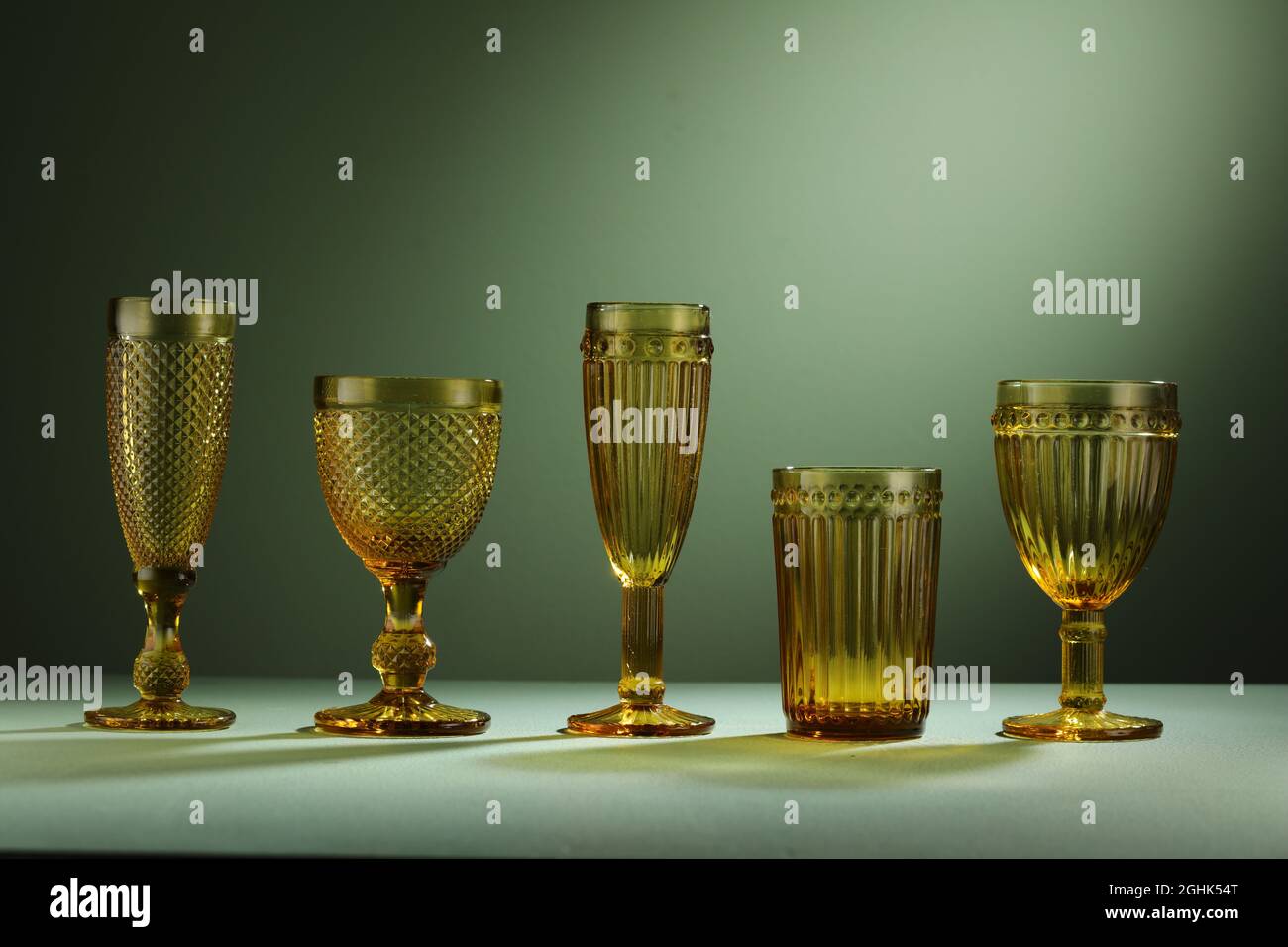 collection of decorative cups on a blue background Stock Photo - Alamy