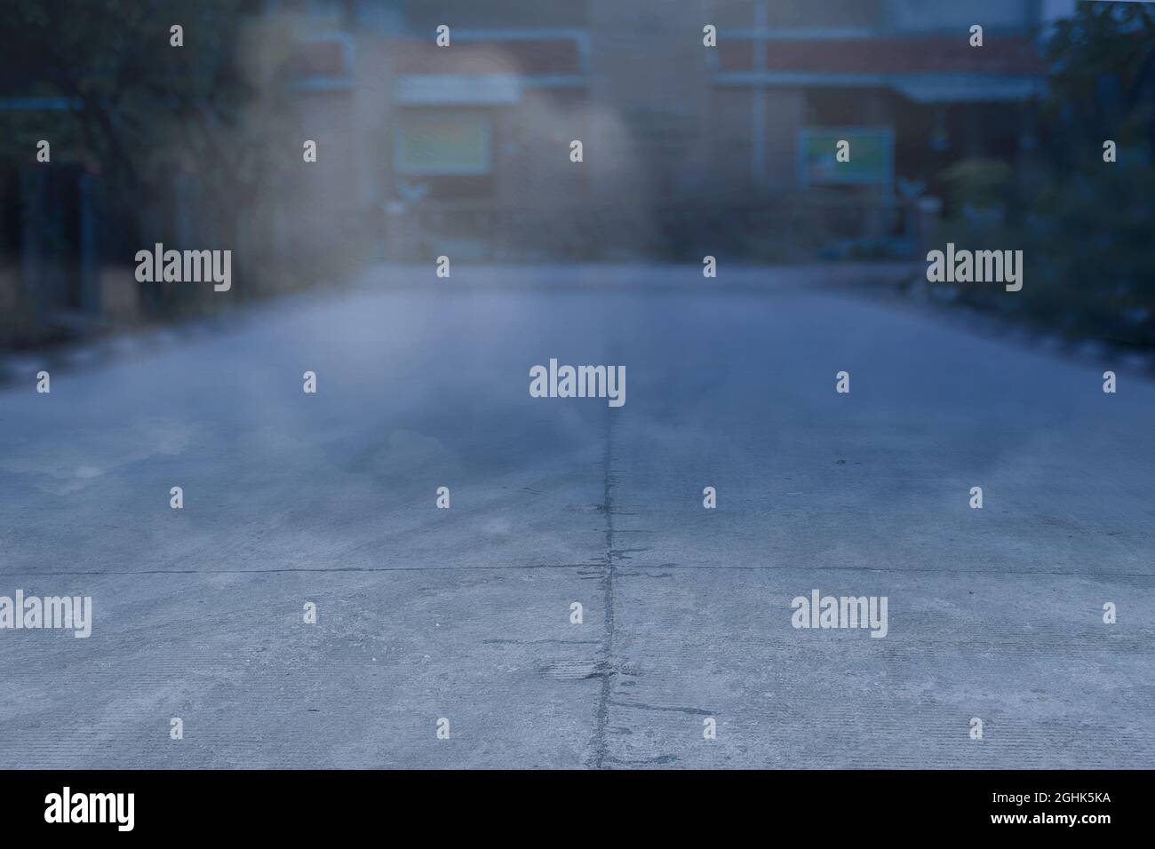 Haunted street with fog and moonlight background. Halloween concept ...
