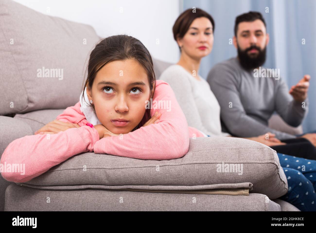 Parents lecturing daughter Stock Photo - Alamy