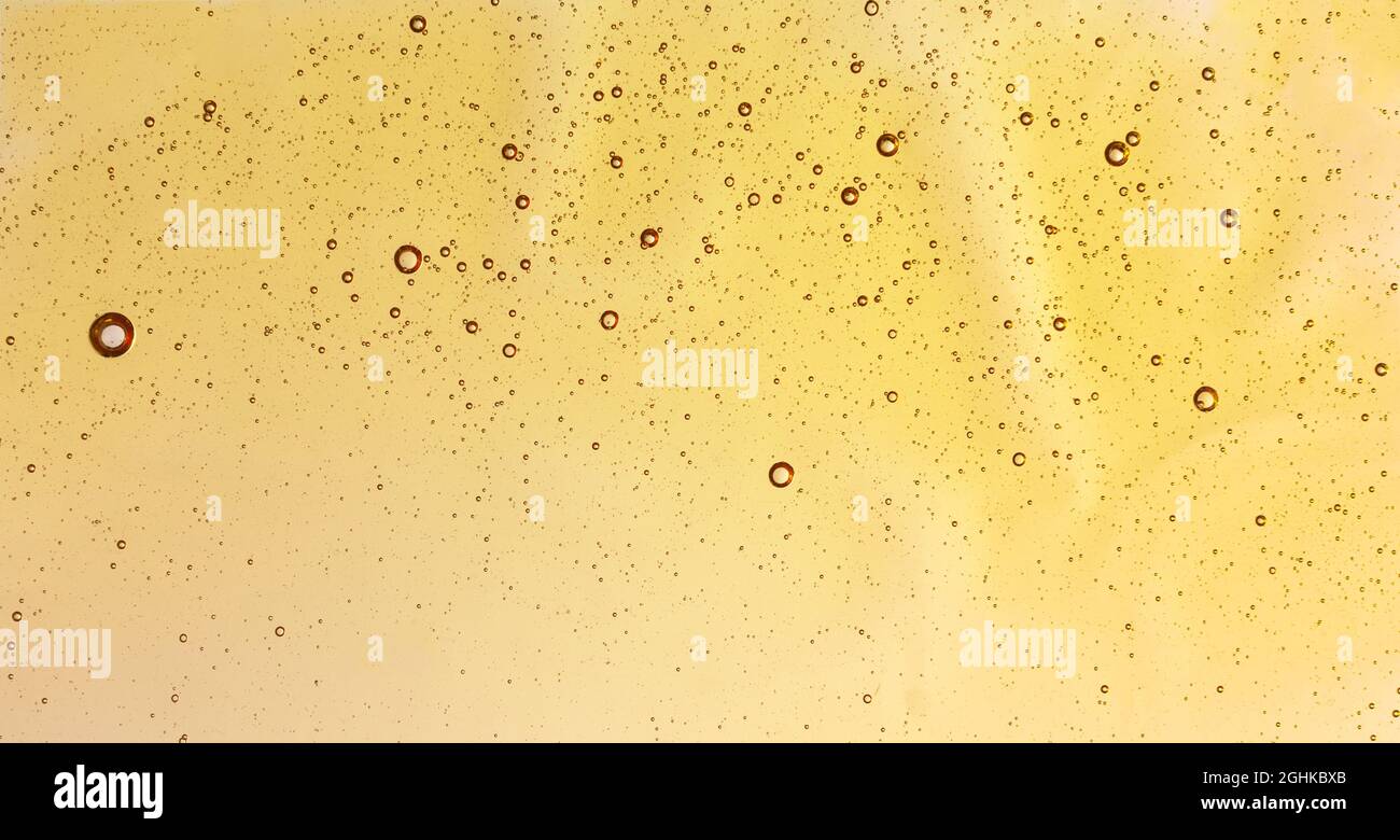 Texture of oil or face serum closeup. Abstract cosmetics oil background ...