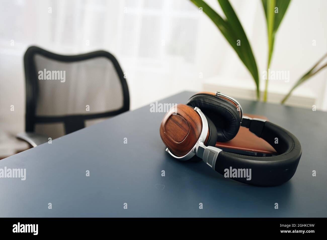 headphones on the table laptop technology Stock Photo - Alamy