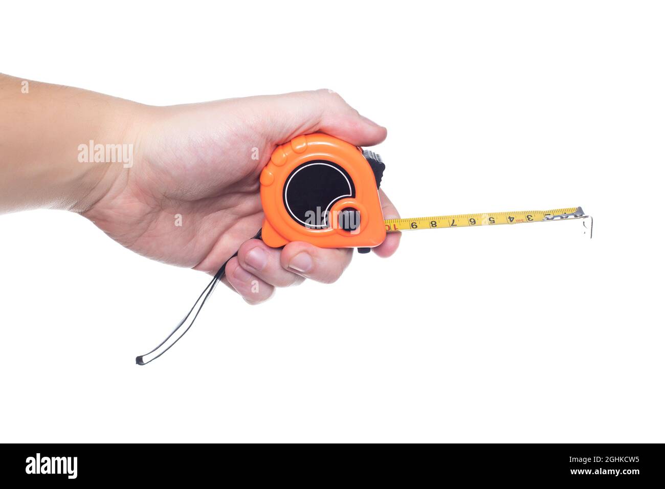 Man engineer holding a measuring tape in his hand on a white background ...