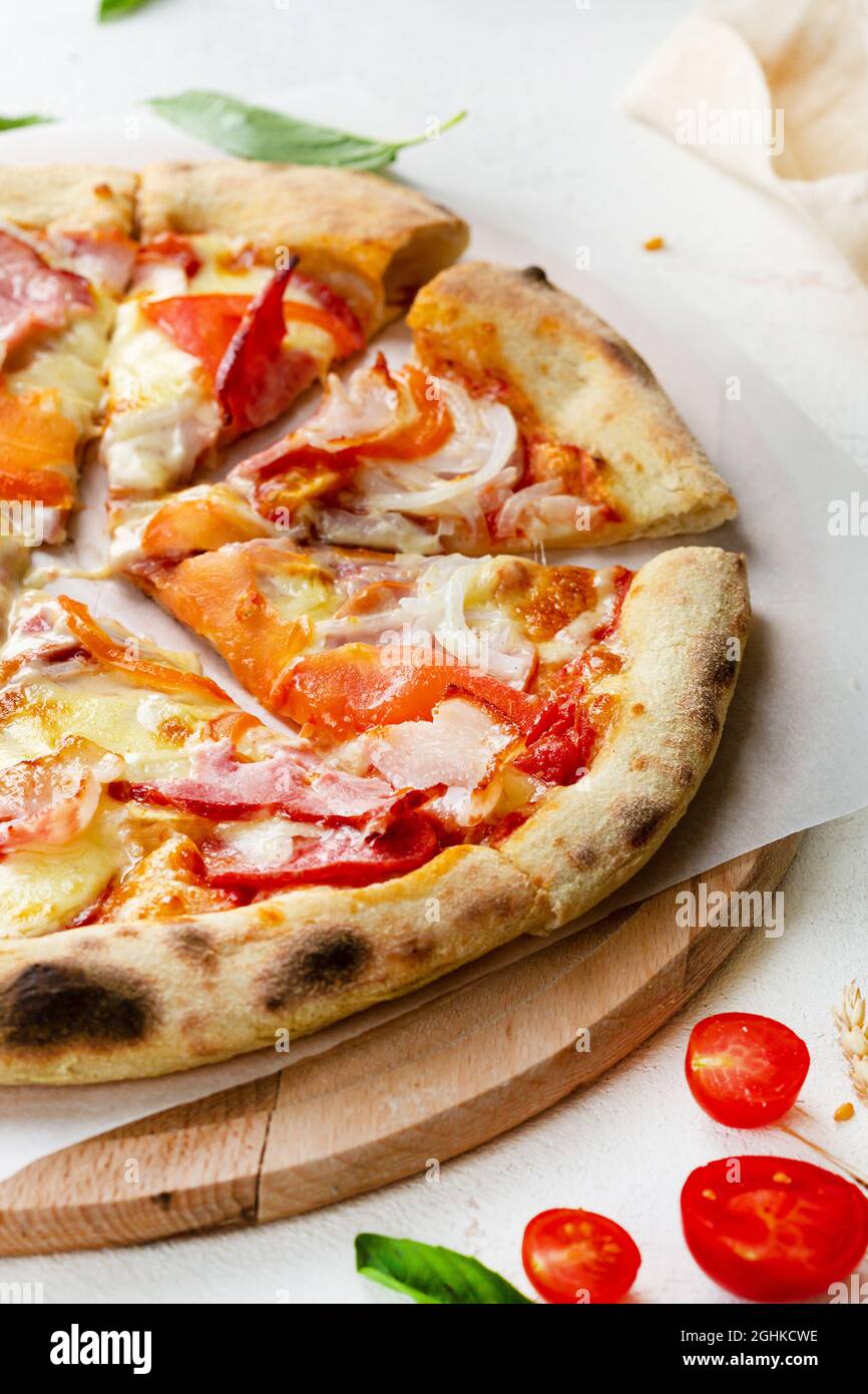 Cheese and ham pizza close up take away food Stock Photo - Alamy