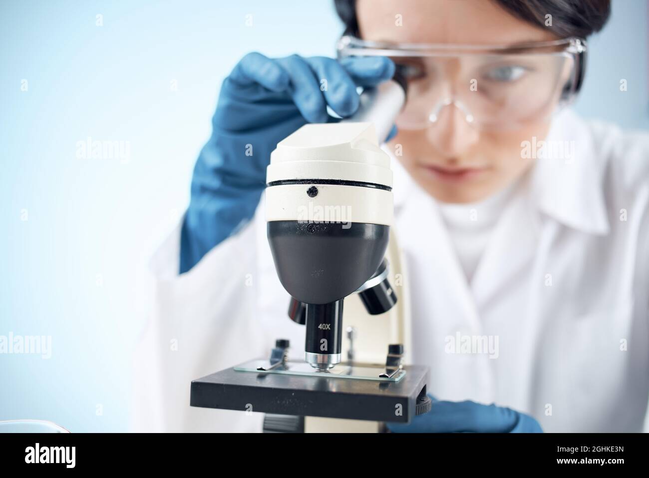 woman laboratory assistant microscope science professional analysis ...