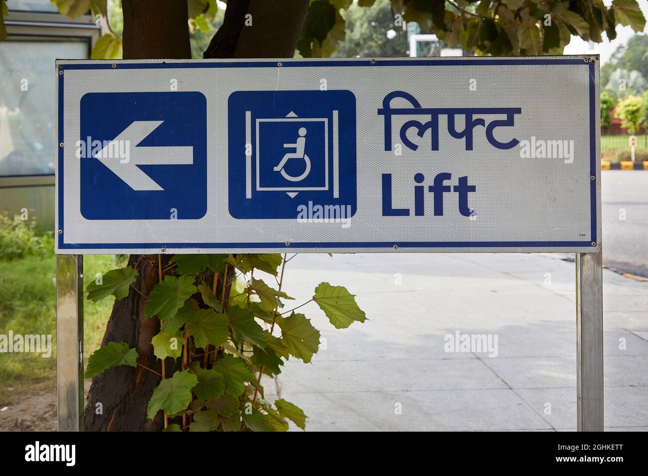 View of a signboard indicating a Lift or Escalator for the differently ...