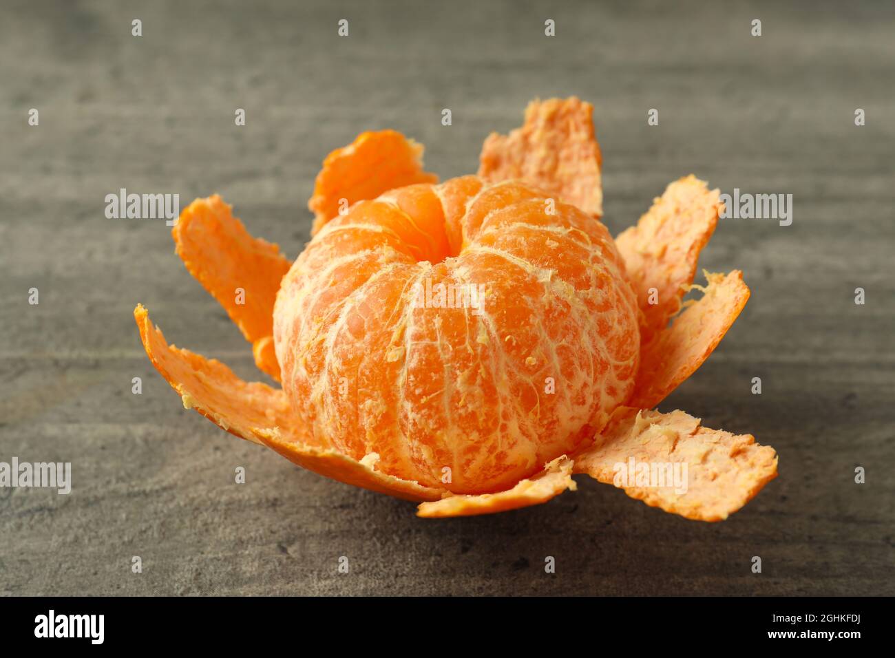 Tasty fresh mandarin on grey textured table Stock Photo - Alamy