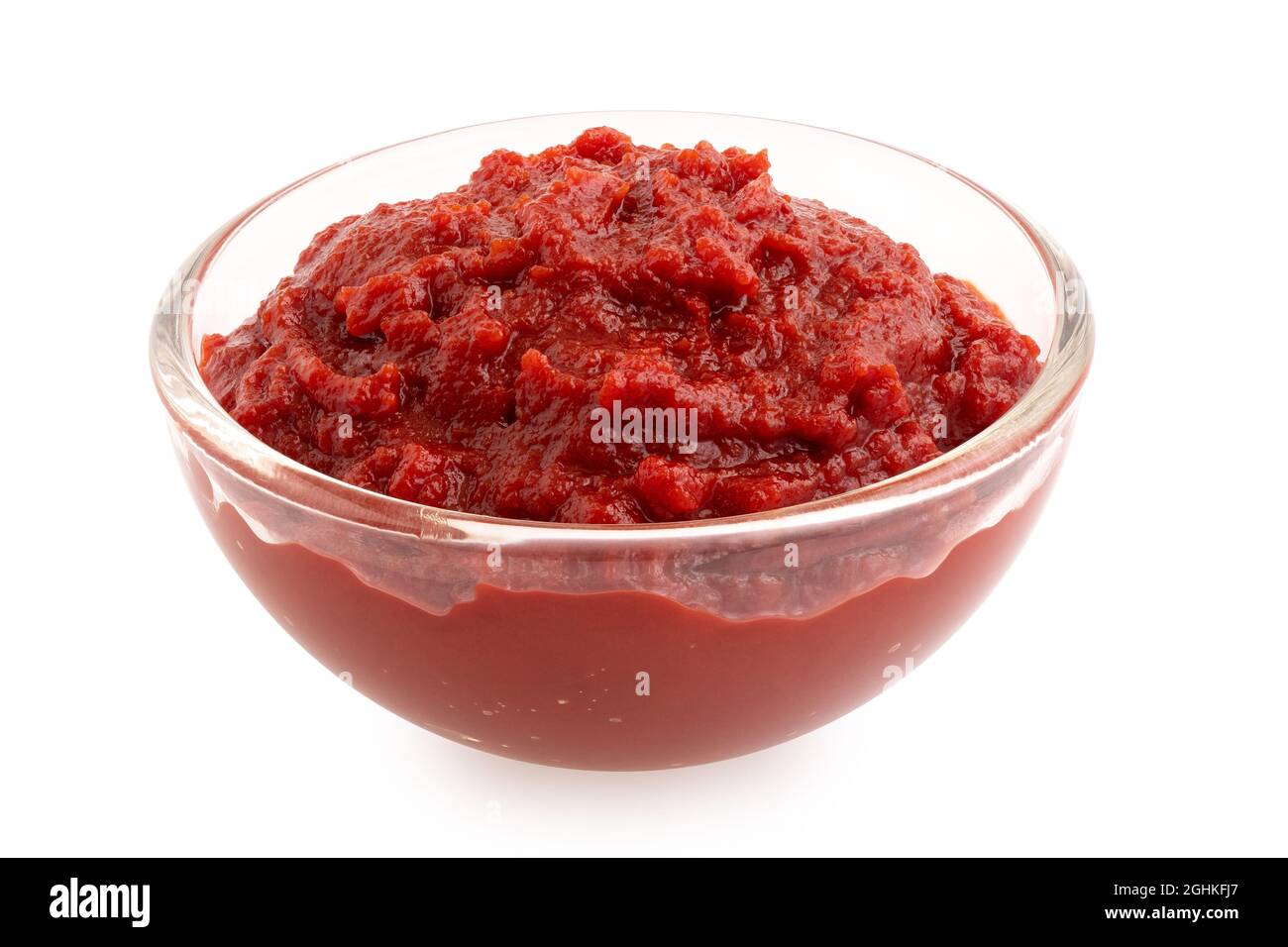 Tomato paste in a glass bowl isolated on white Stock Photo - Alamy