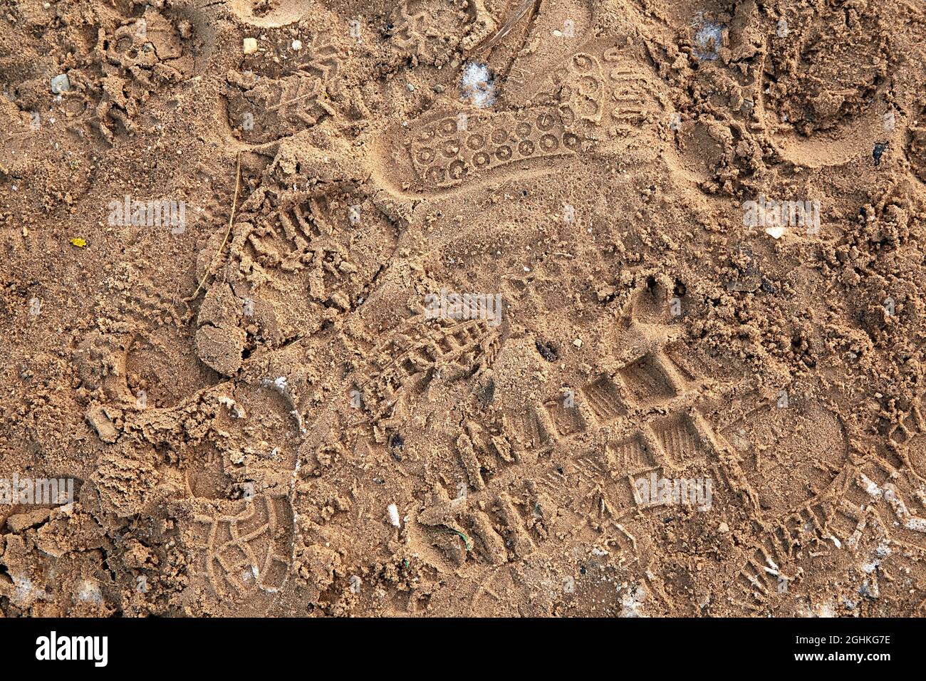 boots tracks on a sand in winter, abstract background Stock Photo - Alamy