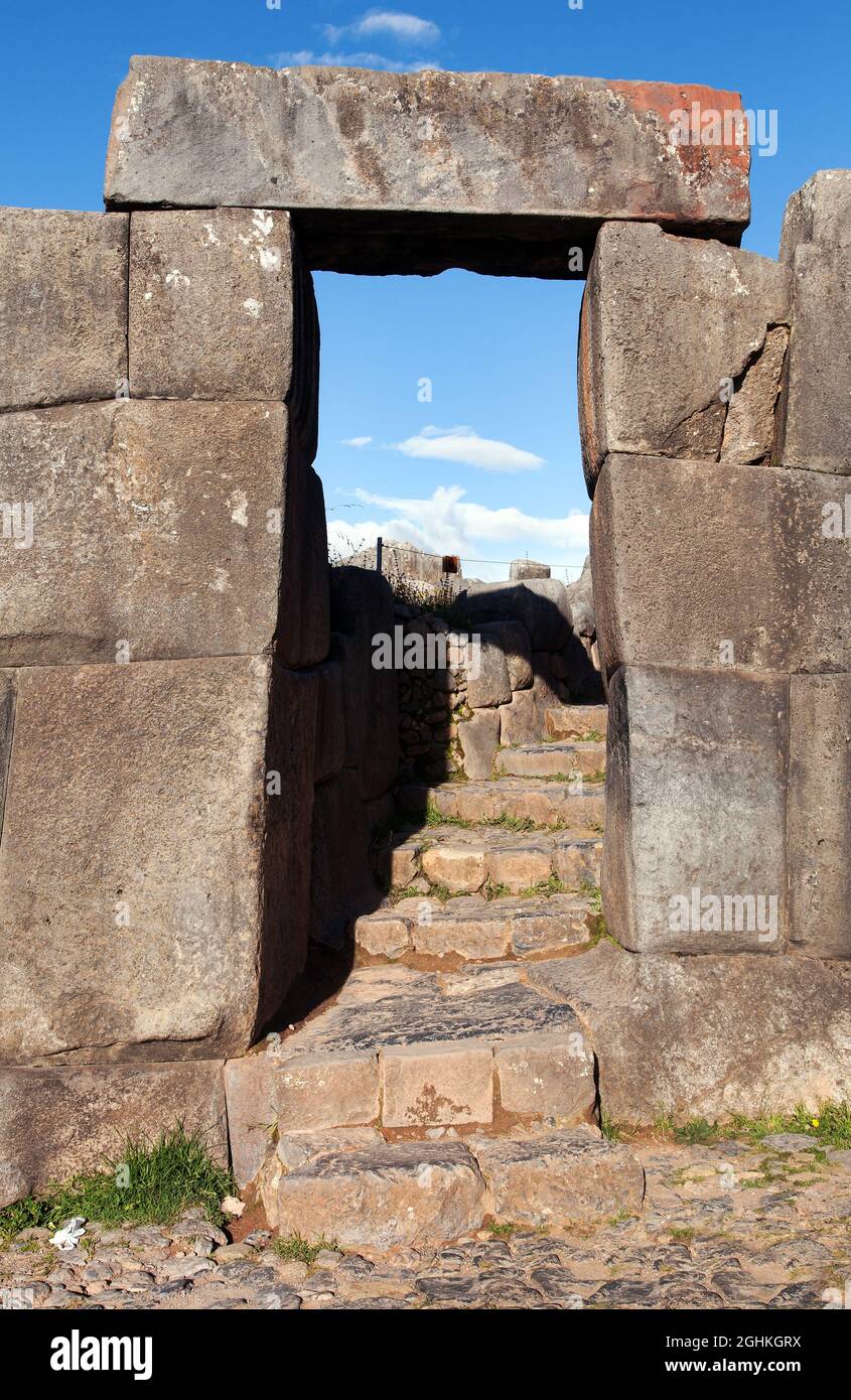 Stone door. View of Sacsayhuaman, Inca ruins in Cusco or Cuzco town ...