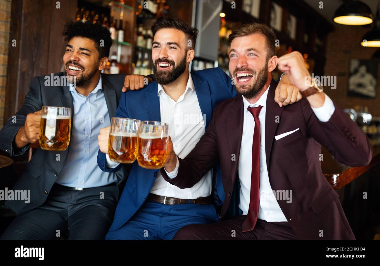 Cheering for football in pub hi-res stock photography and images - Alamy