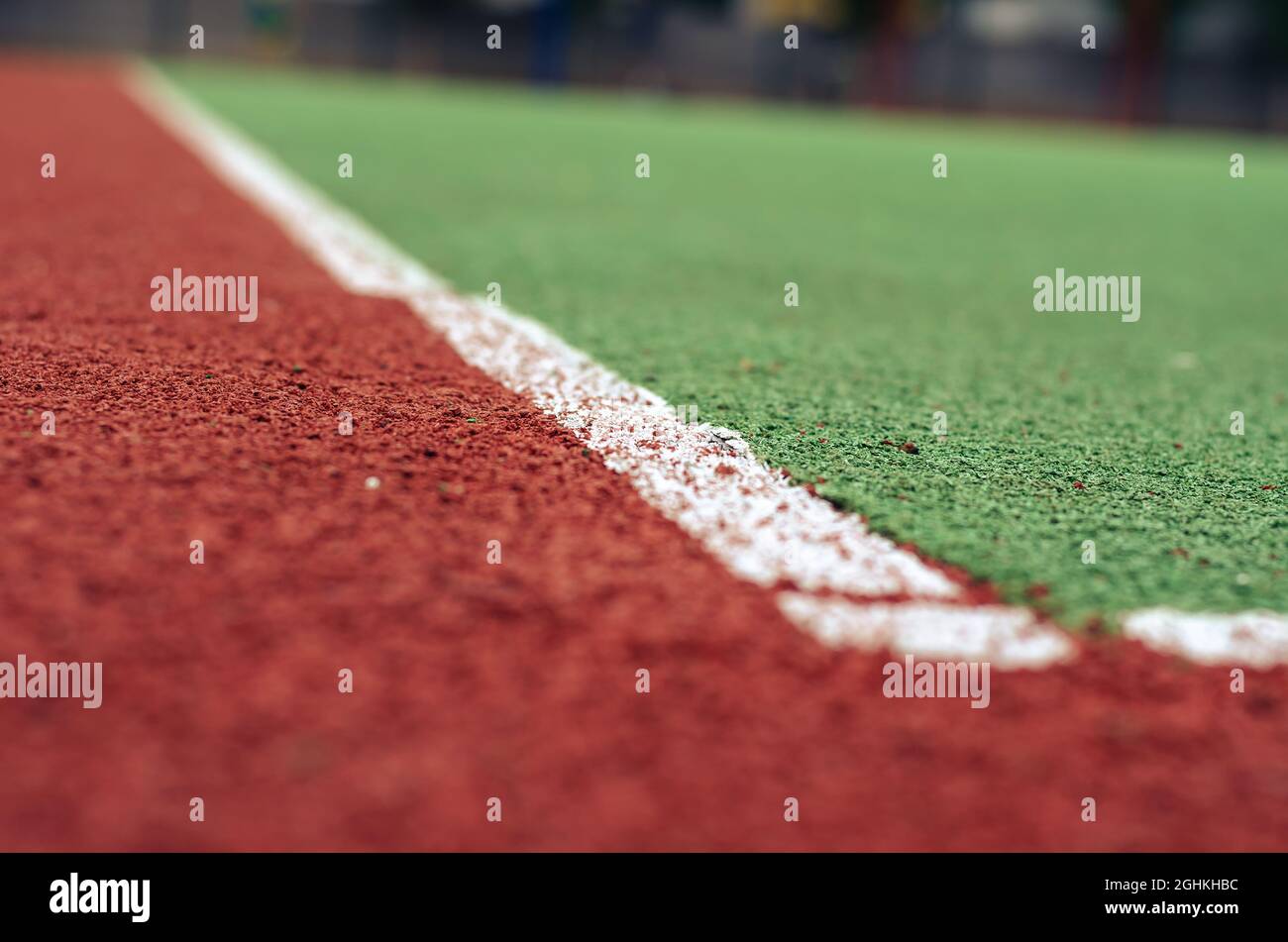 Close-up of an empty soccer field with artificial turf. The field for ...