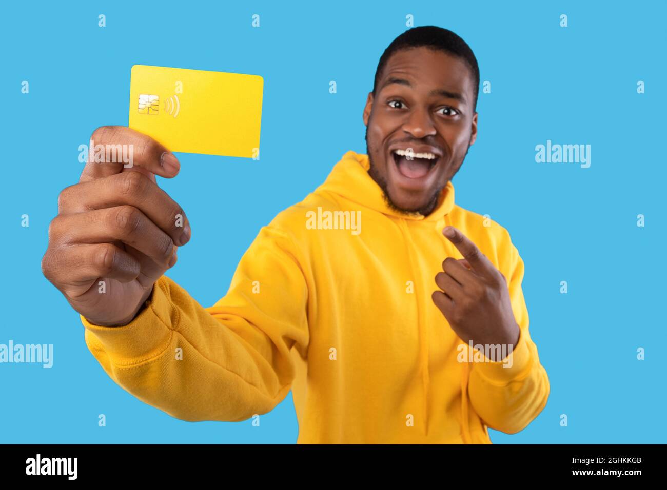 Excited Black Guy Showing Credit Card Posing Over Blue Background Stock ...