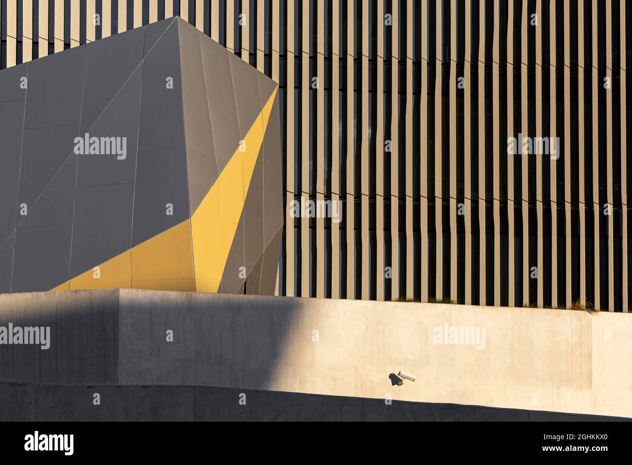 Modern geometric building with surveillance camera Stock Photo - Alamy