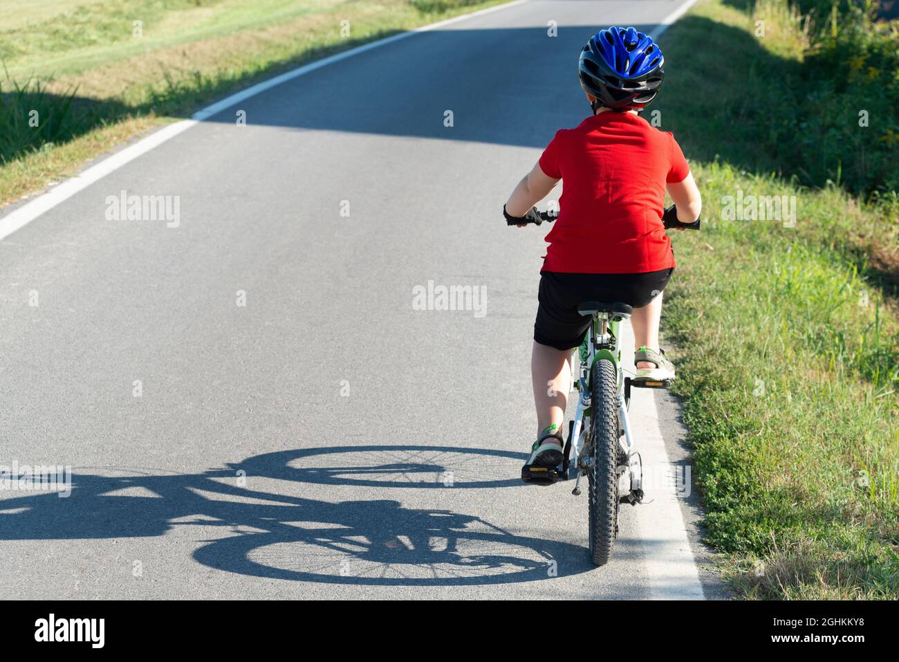Boy Speeding on Mountain Bike Stock Photo - Alamy