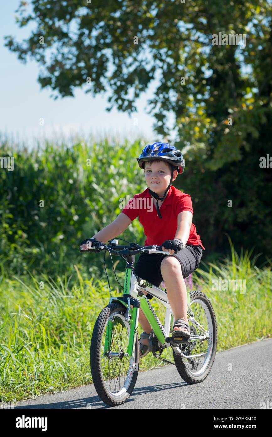 Boy Speeding on Mountain Bike Stock Photo - Alamy