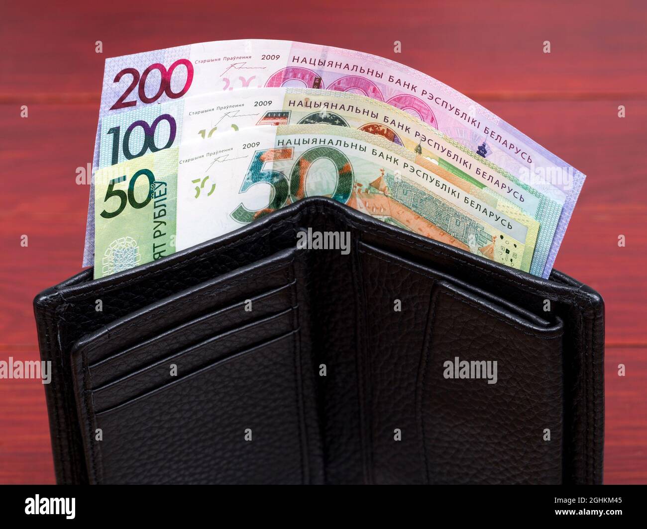 Belarusian ruble in the black wallet Stock Photo - Alamy