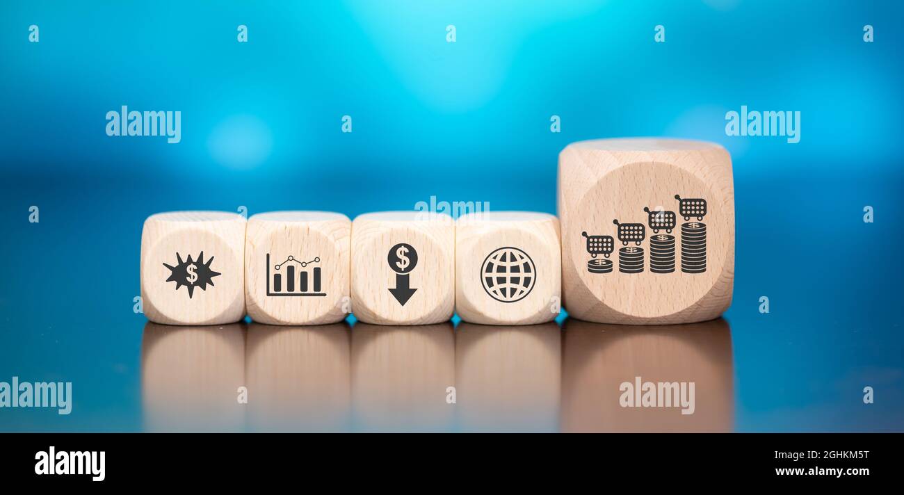 Wooden blocks with symbol of inflation concept on blue background Stock ...