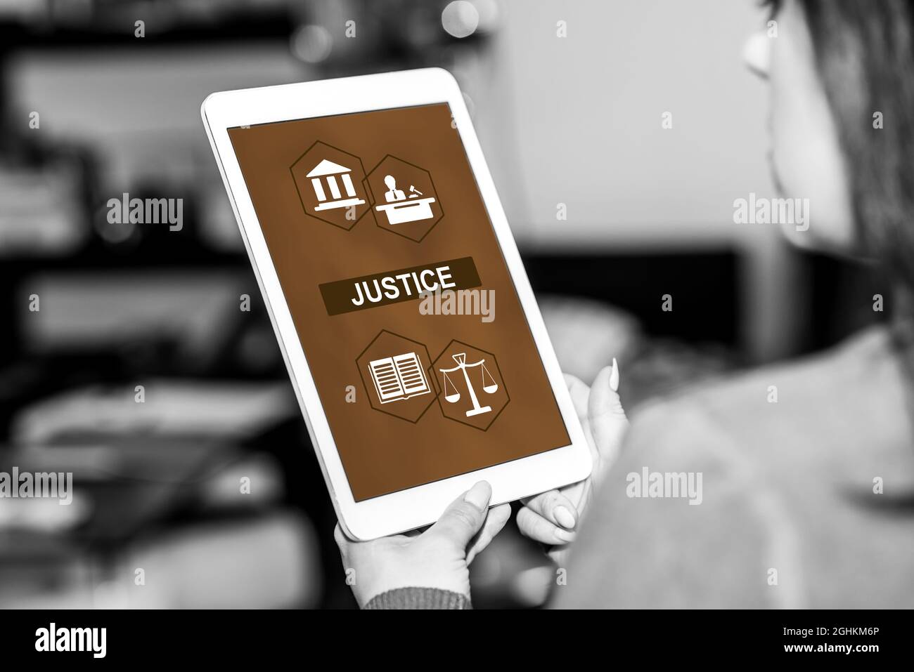 Tablet screen displaying a justice concept Stock Photo - Alamy