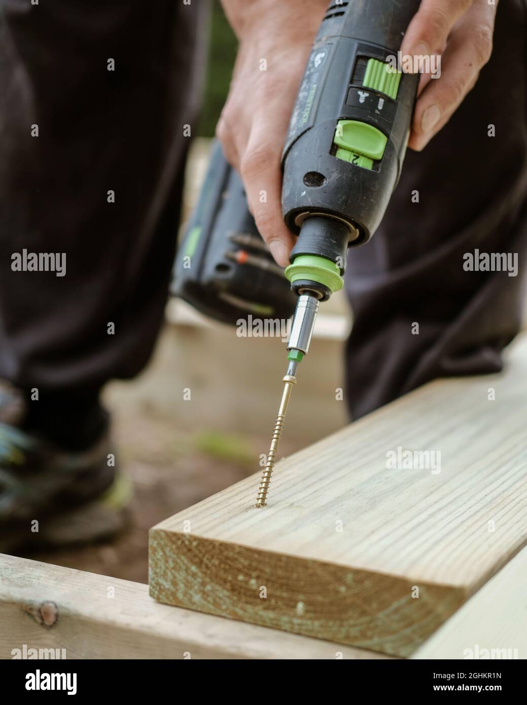 Man repair drill hammer hi-res stock photography and images - Alamy