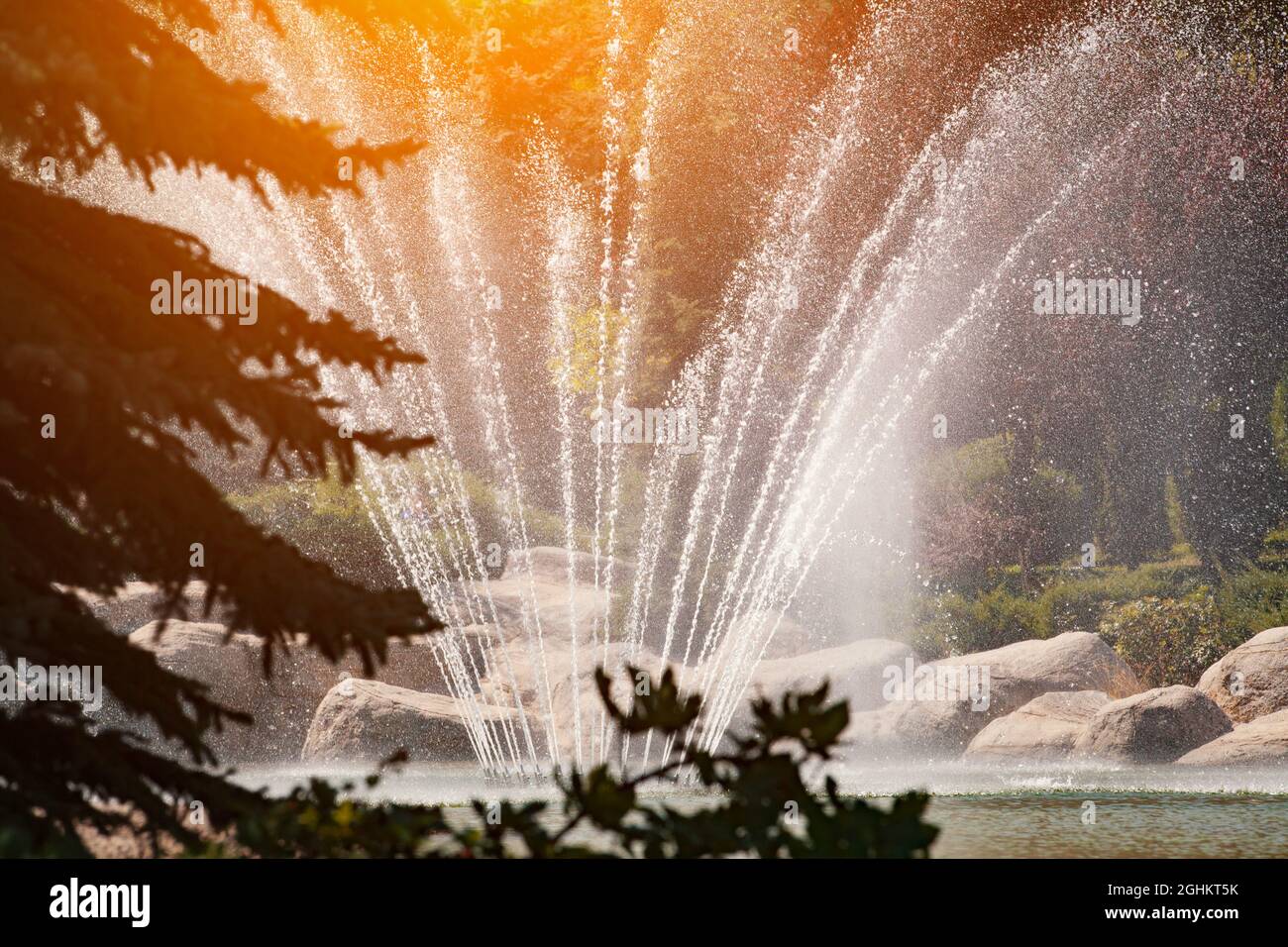 Big water fountain squirting water up in the air in Dikmen Valley Park ...