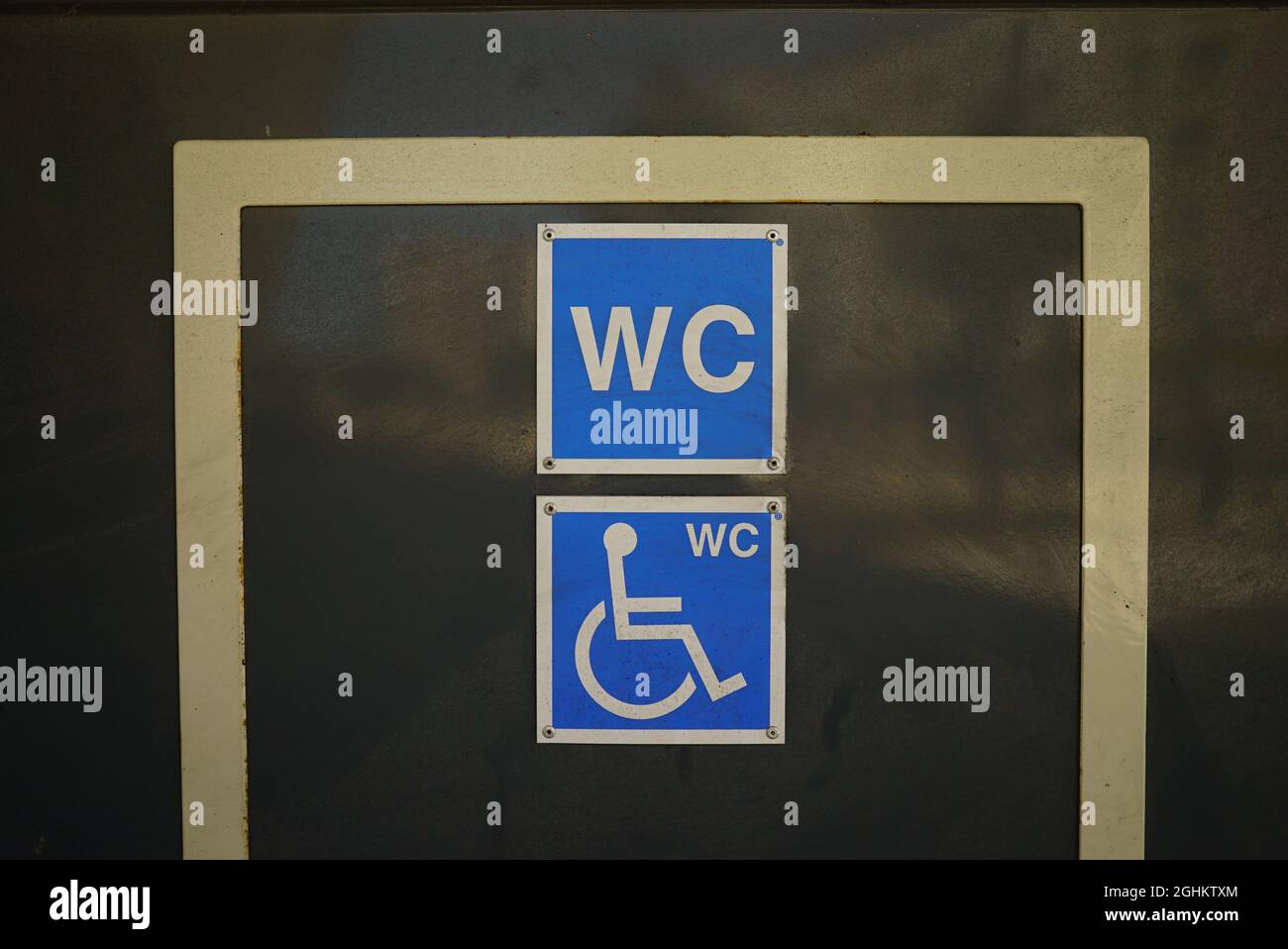 Closeup shot of a door sign for a restroom for disabled people Stock ...