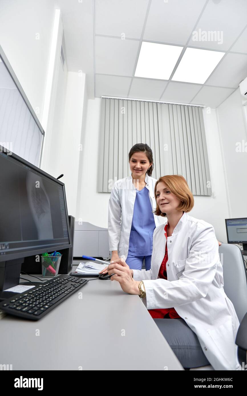 Chest, lung x ray on a doctor's computer screen on a desk. Female ...