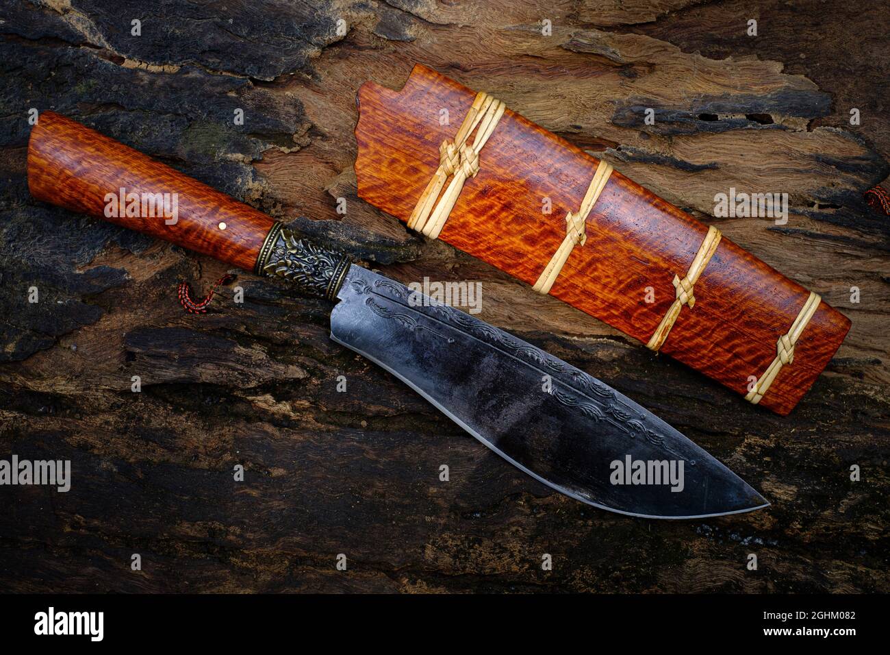 knife custom or Enep in the natural wood scabbard on old table ...