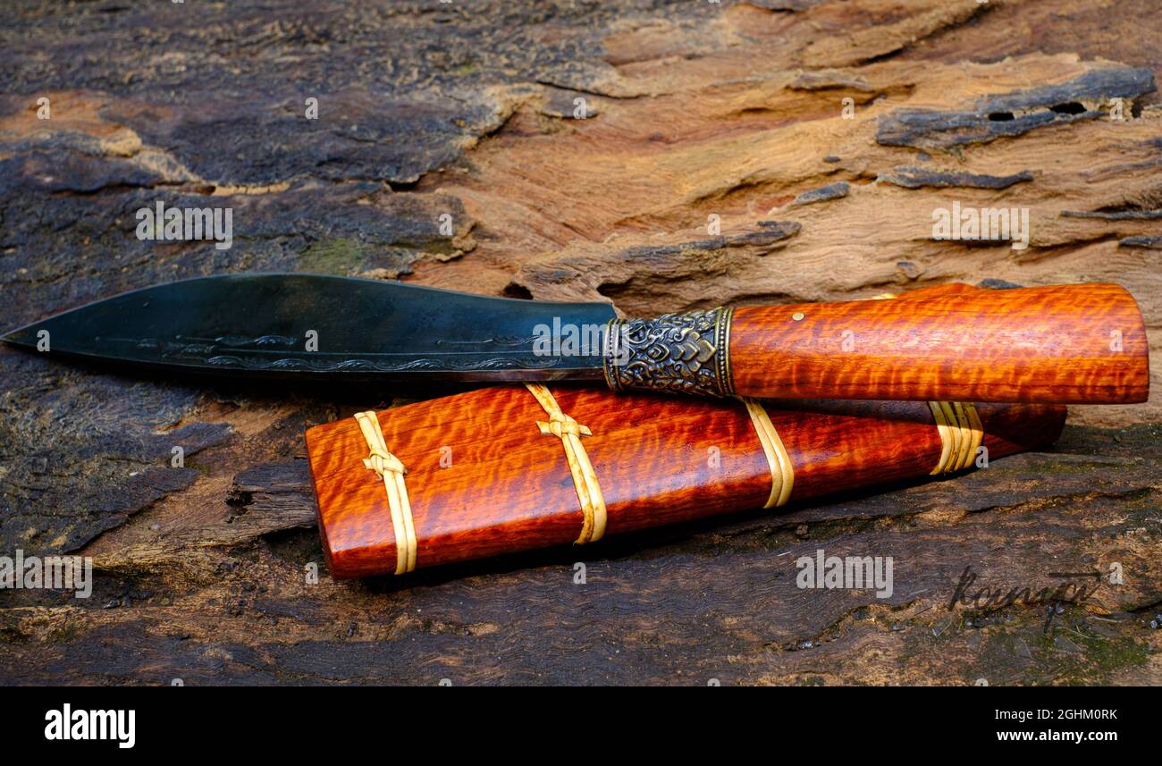 knife custom or Enep in the natural wood scabbard on old table ...