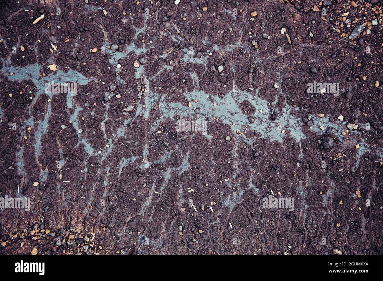 Tar residue shapes texture Stock Photo - Alamy