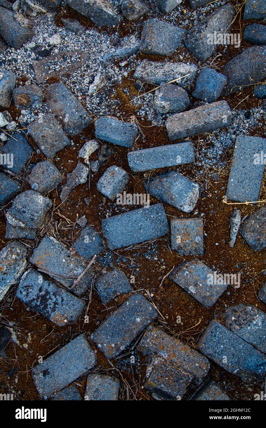 Loose brick texture on polluted soil Stock Photo - Alamy