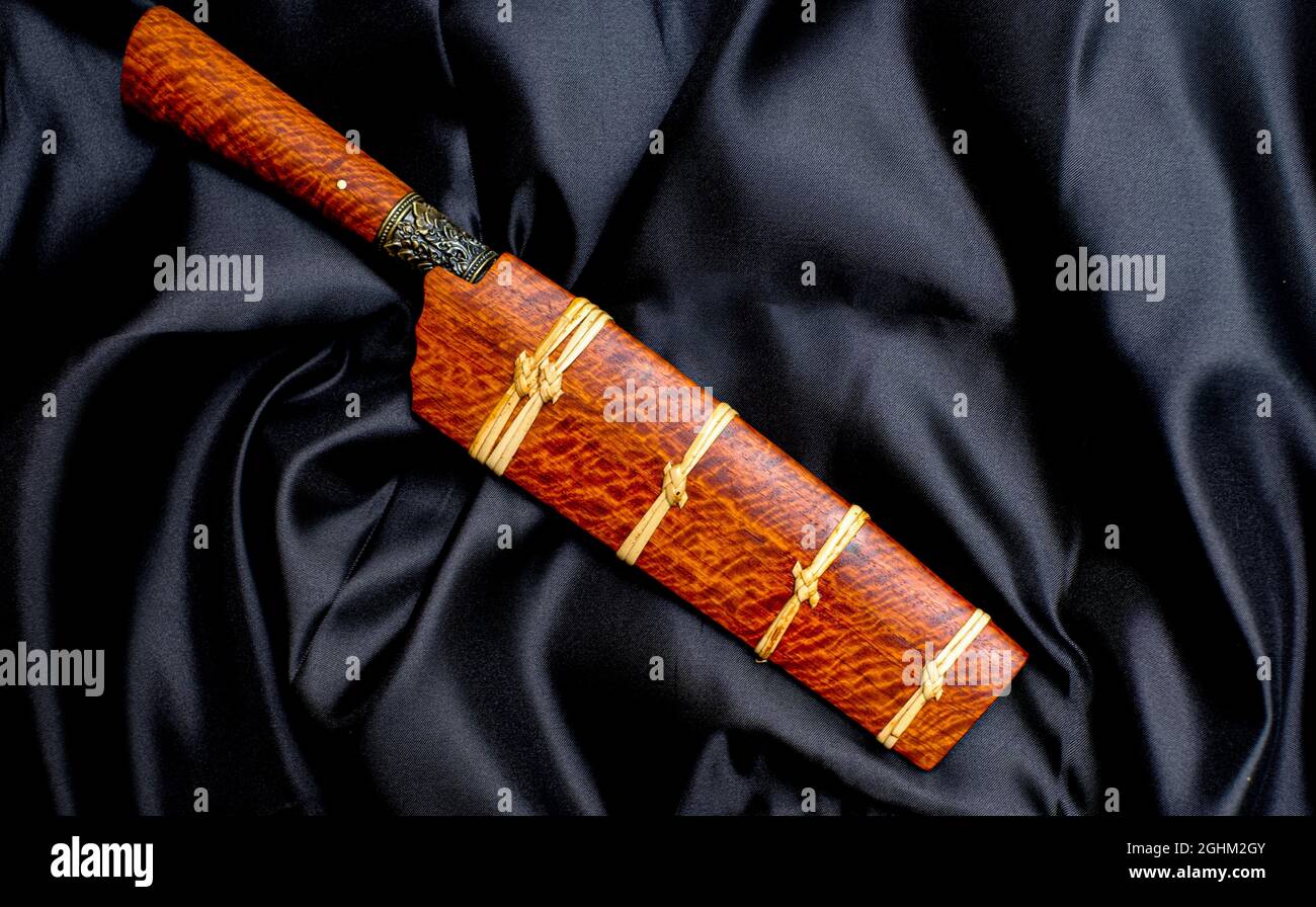 knife custom or Enep in the natural wood scabbard on old table ...