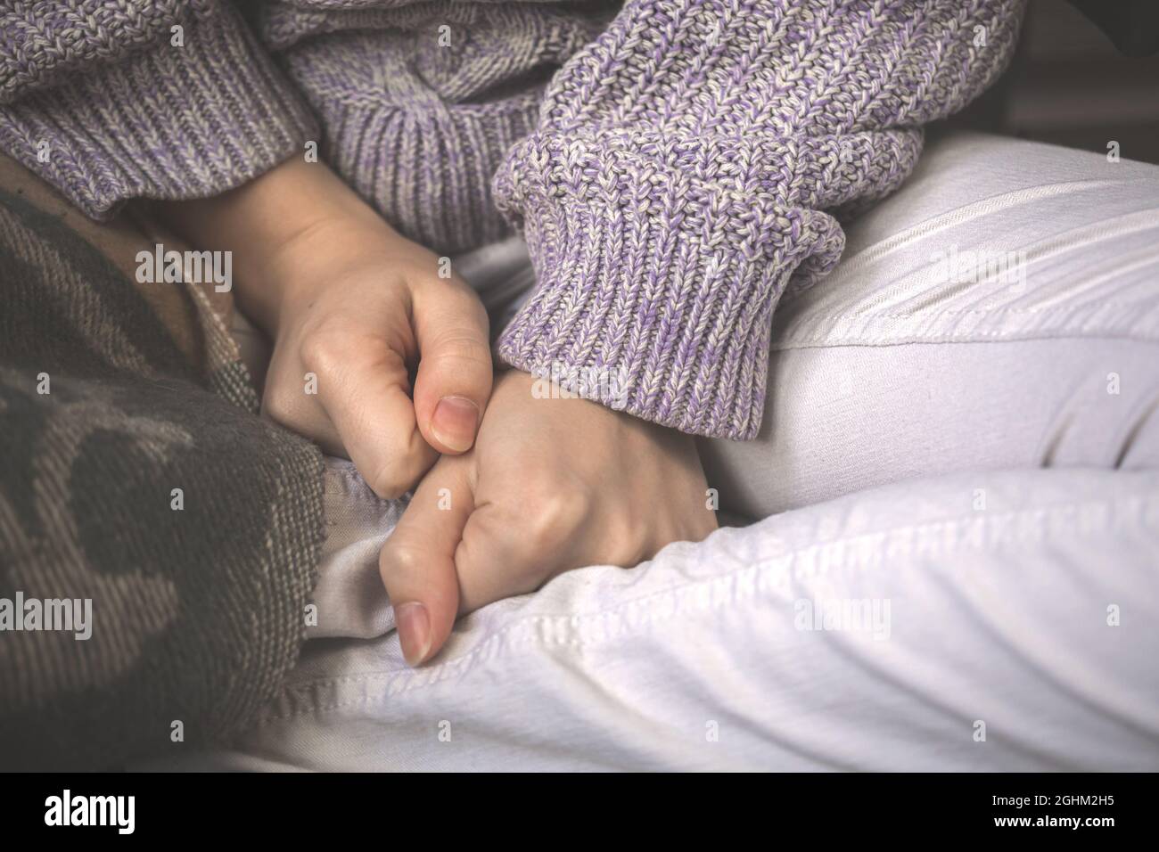 Female cold hands, winter and autumn season background Stock Photo - Alamy