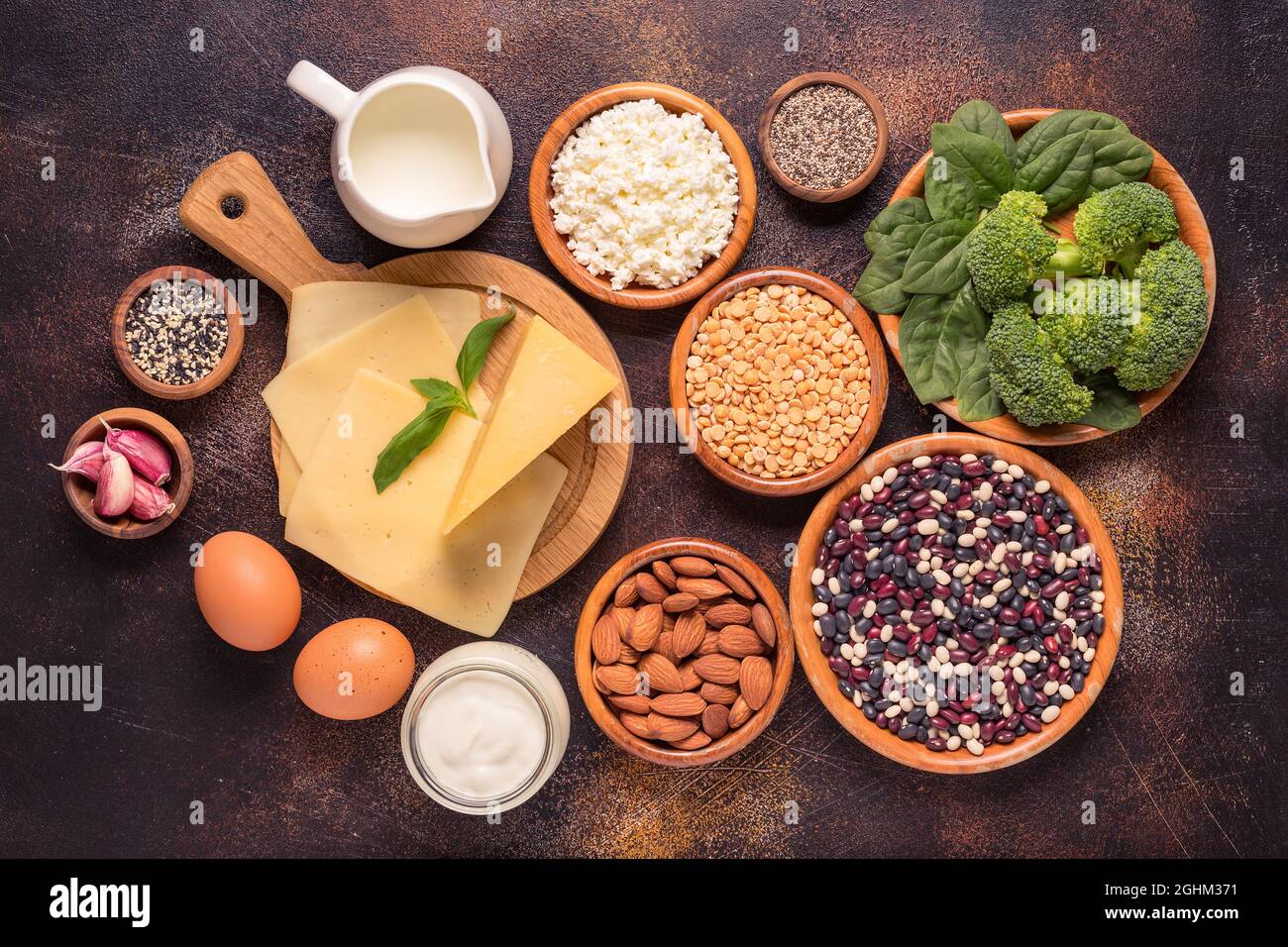 Products rich in calcium on dark background. Healthy food. Top view ...