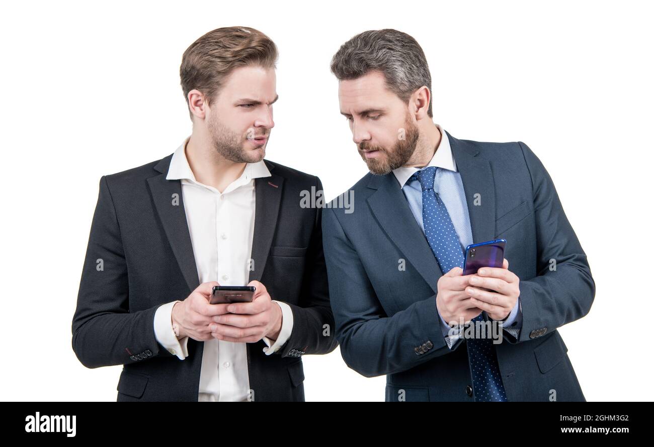 two business colleagues in suit use phone for negotiation isolated on ...