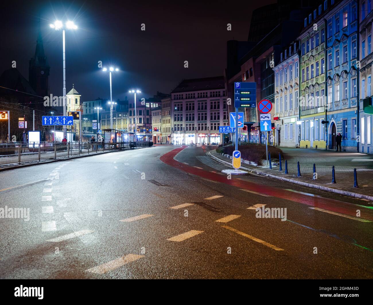 empty night illuminated city road in the european city Stock Photo - Alamy