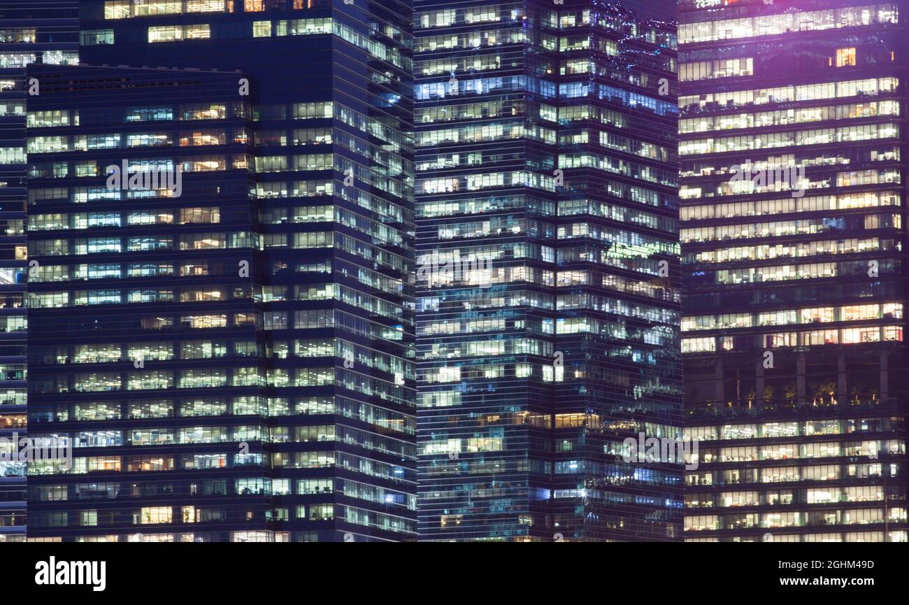 skyscrapers windows at night in Singapore Stock Photo - Alamy